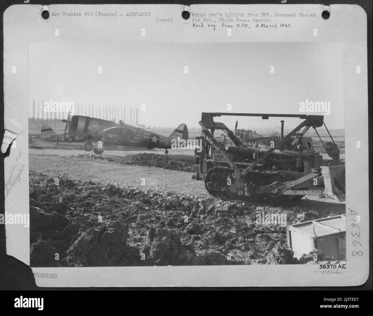 These Republic P-47s of the First Tactical Air force are shown taxiing ...