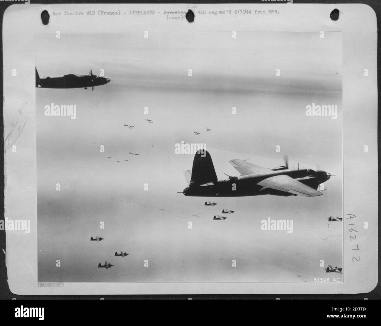 While far below a convoy of United Nations ships steam toward England ...