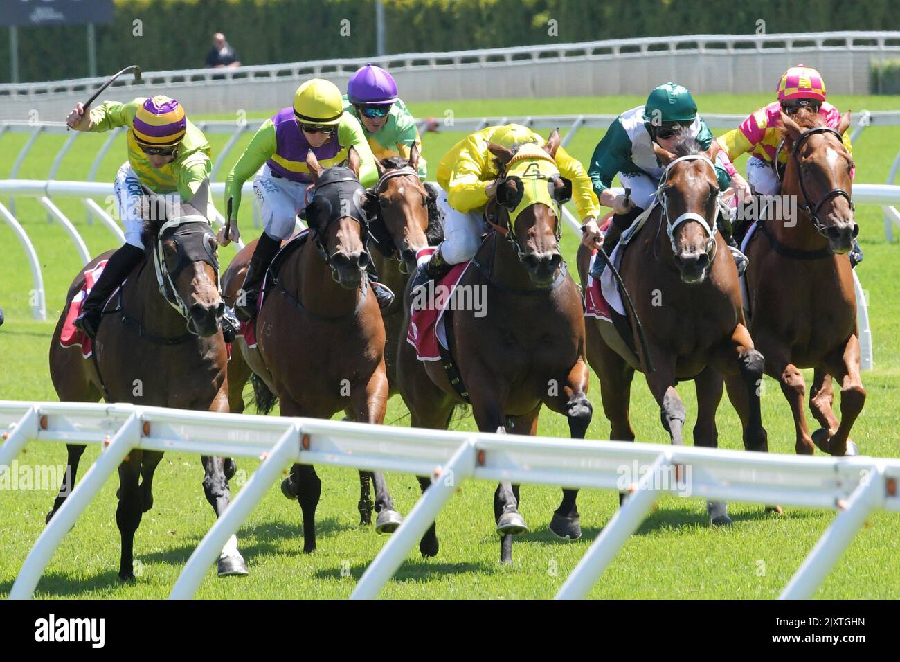 Jockey Adam Hyeroninmus rides Beauty Kanas (left) to victory in race 3 ...