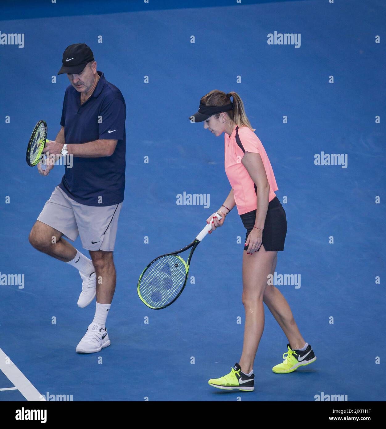 Belinda Bencic of Switzerland is coached by her father Ivan during a ...