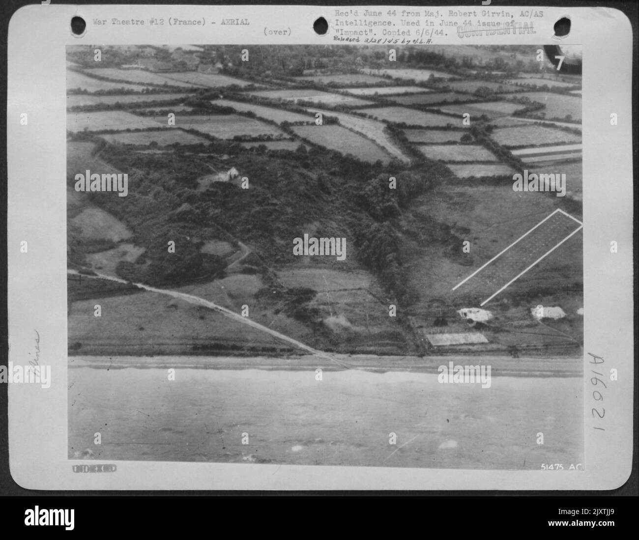 Coastal mine belt at Cabourg, France, indicated here by white linen ...