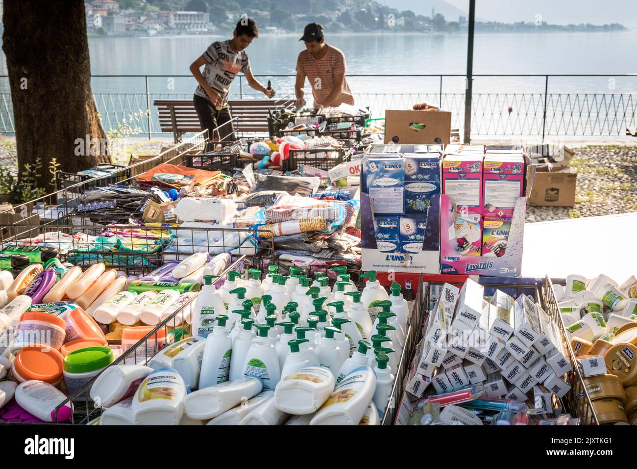 Market traders layout their stall of household goods alongside Lake ...