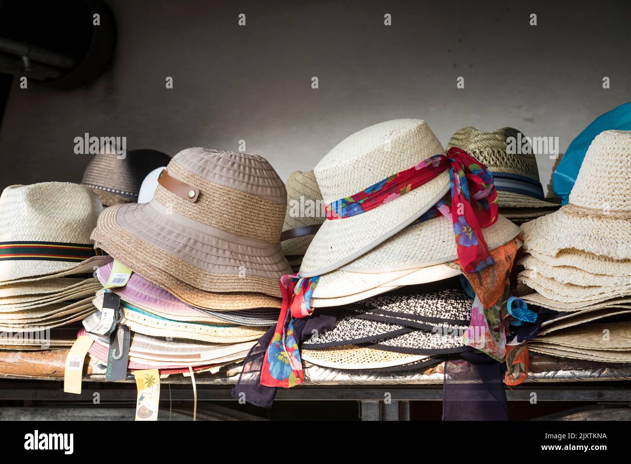 Stacked straw hats hi-res stock photography and images - Alamy