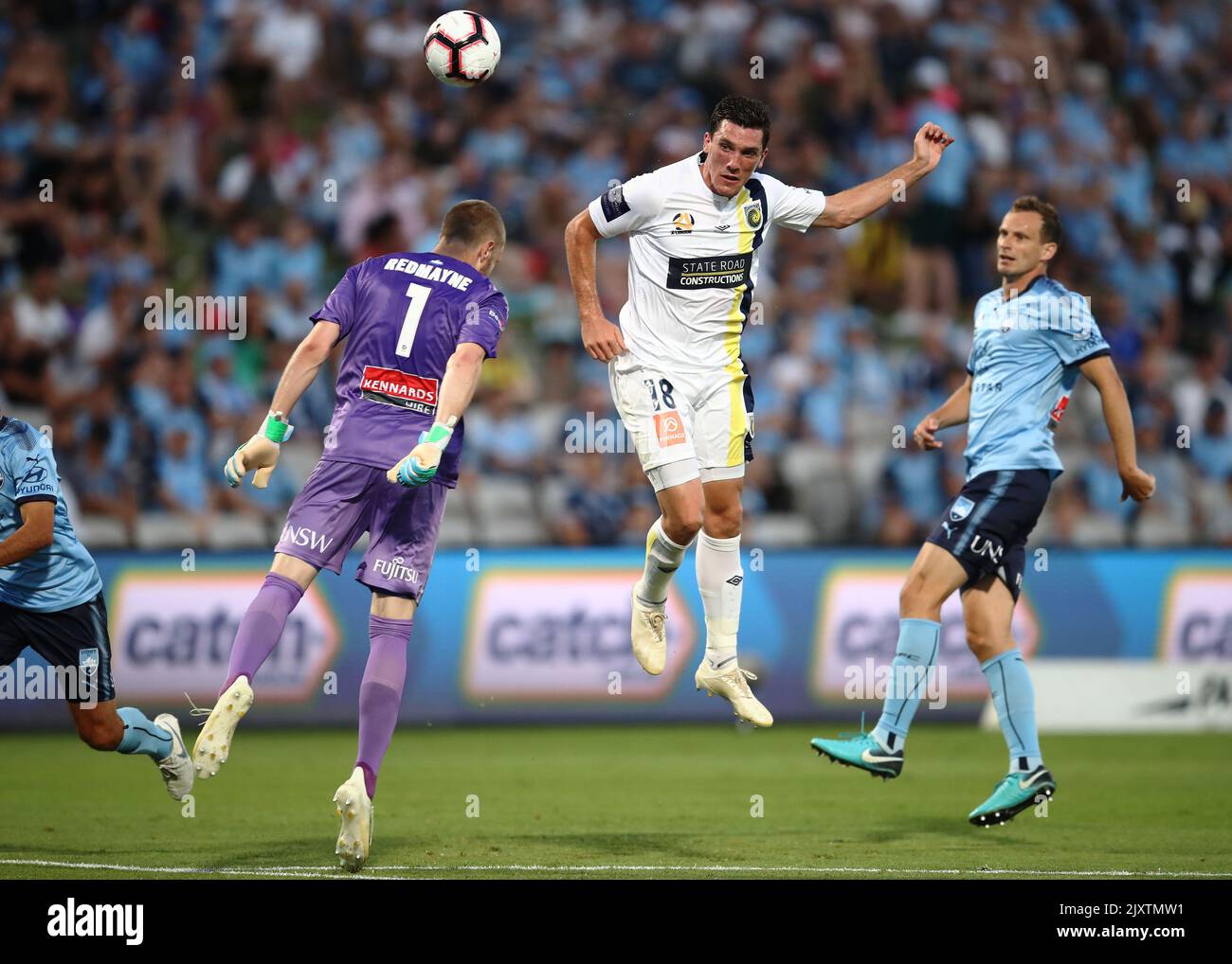 Matthew Millar of the Mariners heads the ball during the Round 11 A ...
