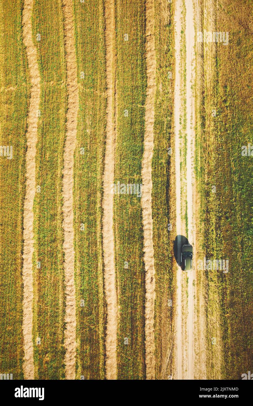 Elevated Aerial View Of Green Car Vehicle Automobile On Countryside ...