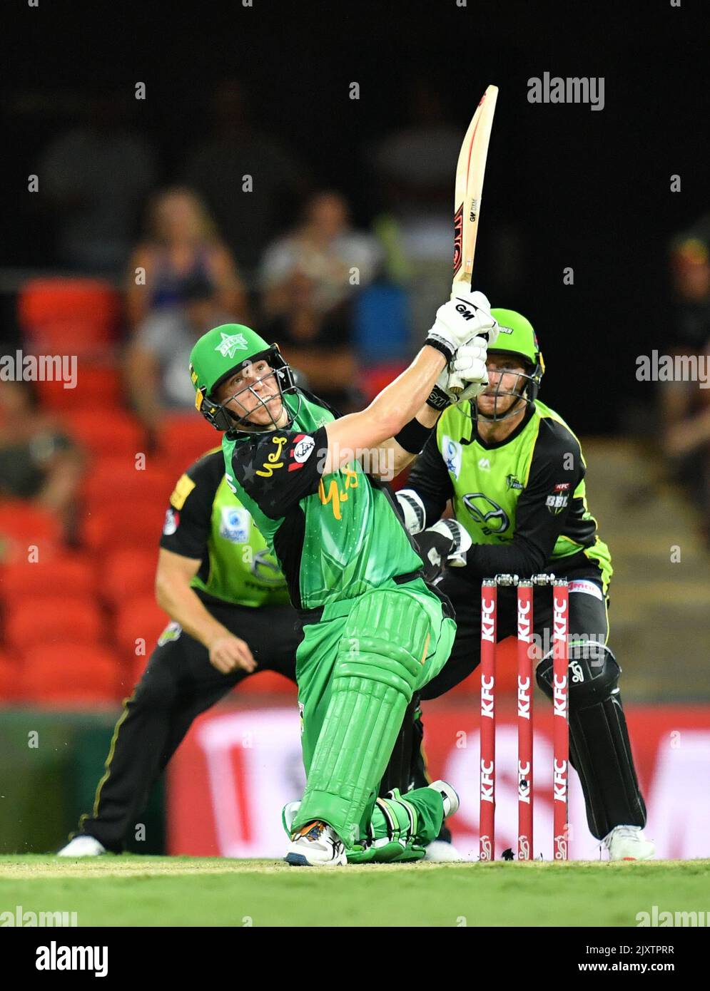 Nick Larkin (centre) of the Stars in action during the Big Bash League ...