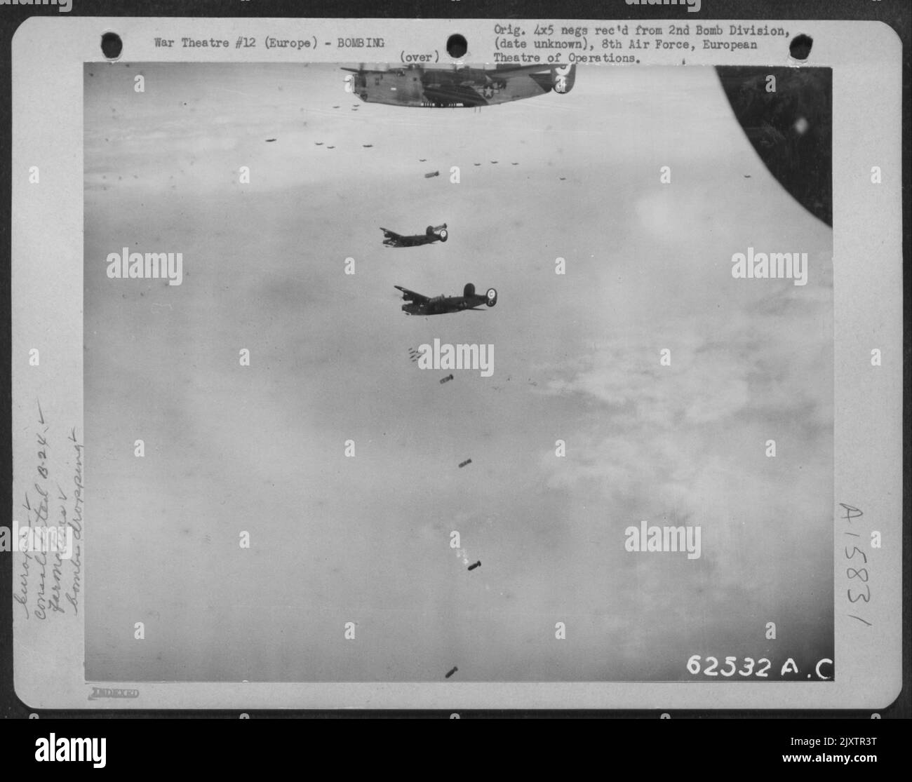 Bombs From The Consolidated B-24 Liberators Fall On Nazi Installations ...
