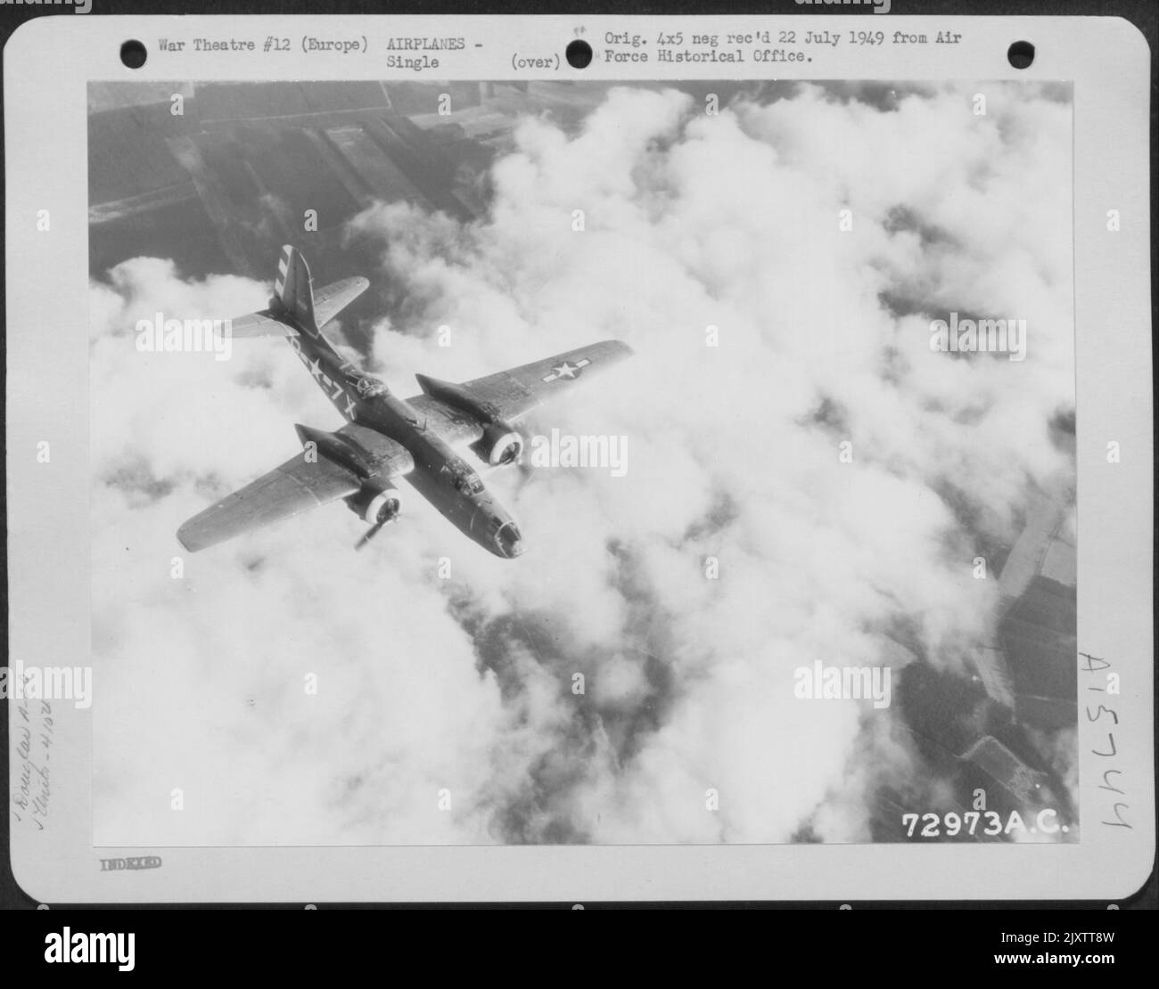 A Douglas A-20 Of The 410Th Bomb Group, Flies Above Clouds Entroute To ...