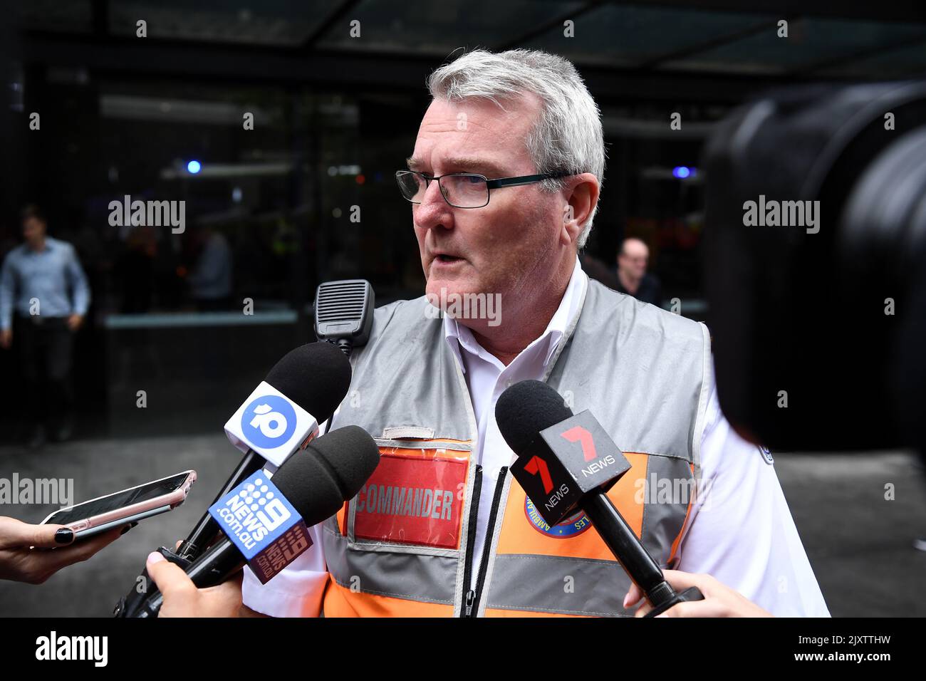 NSW Ambulance Inspector Michael Corlis speaks to the media outside 44 ...