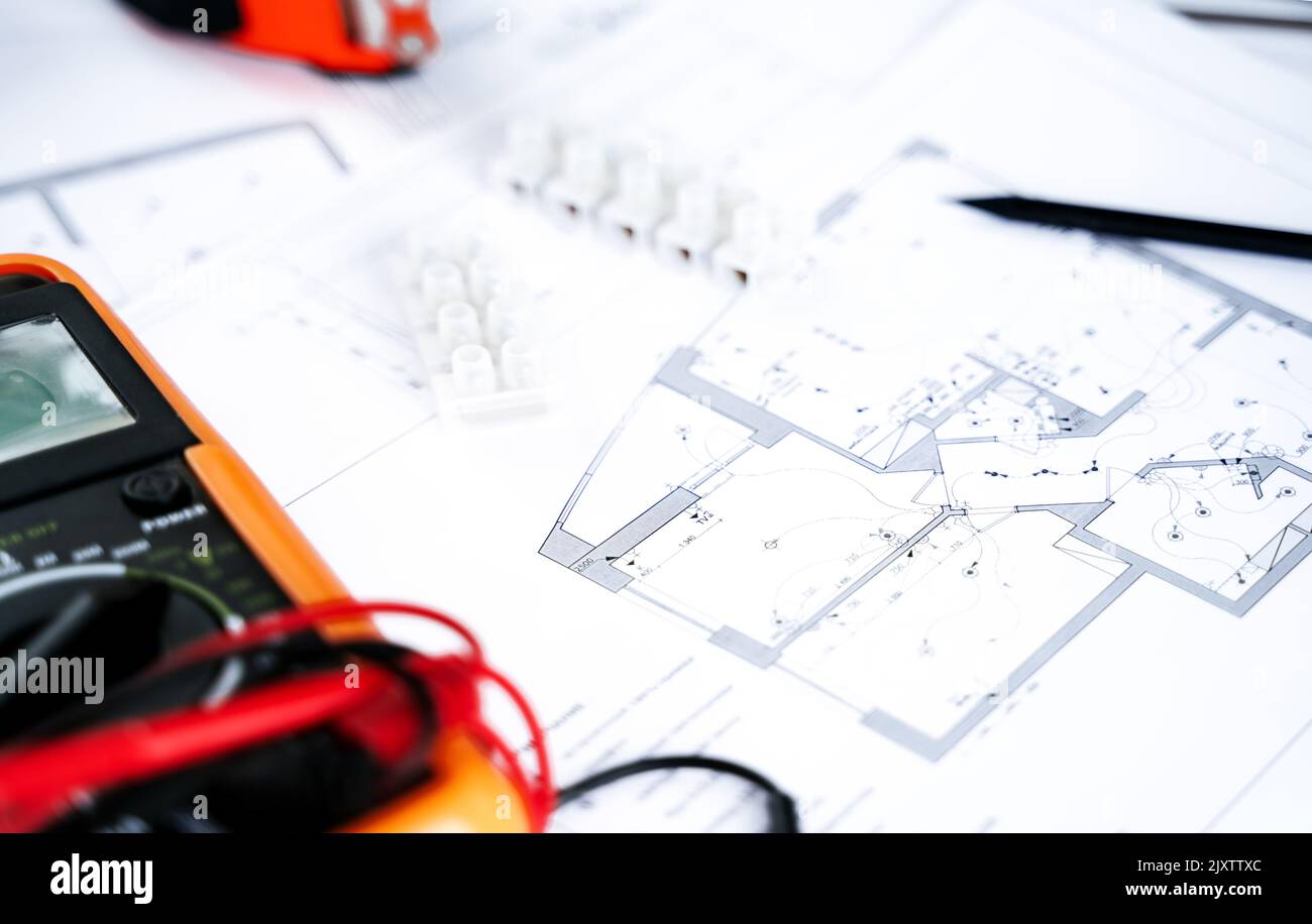 Making repairs,planning electricity project in house.Drawings,diagrams ...