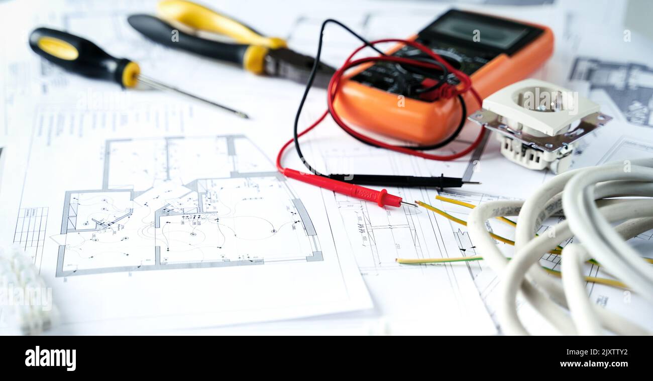 Making repairs,planning electricity project in house.Drawings,diagrams ...