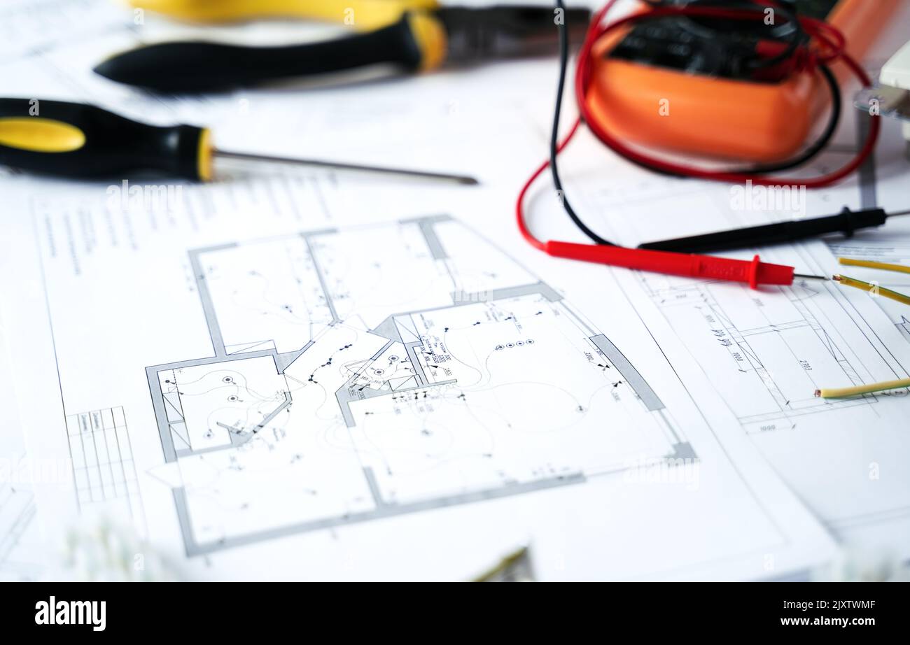 Making repairs,planning electricity project in house.Drawings,diagrams ...