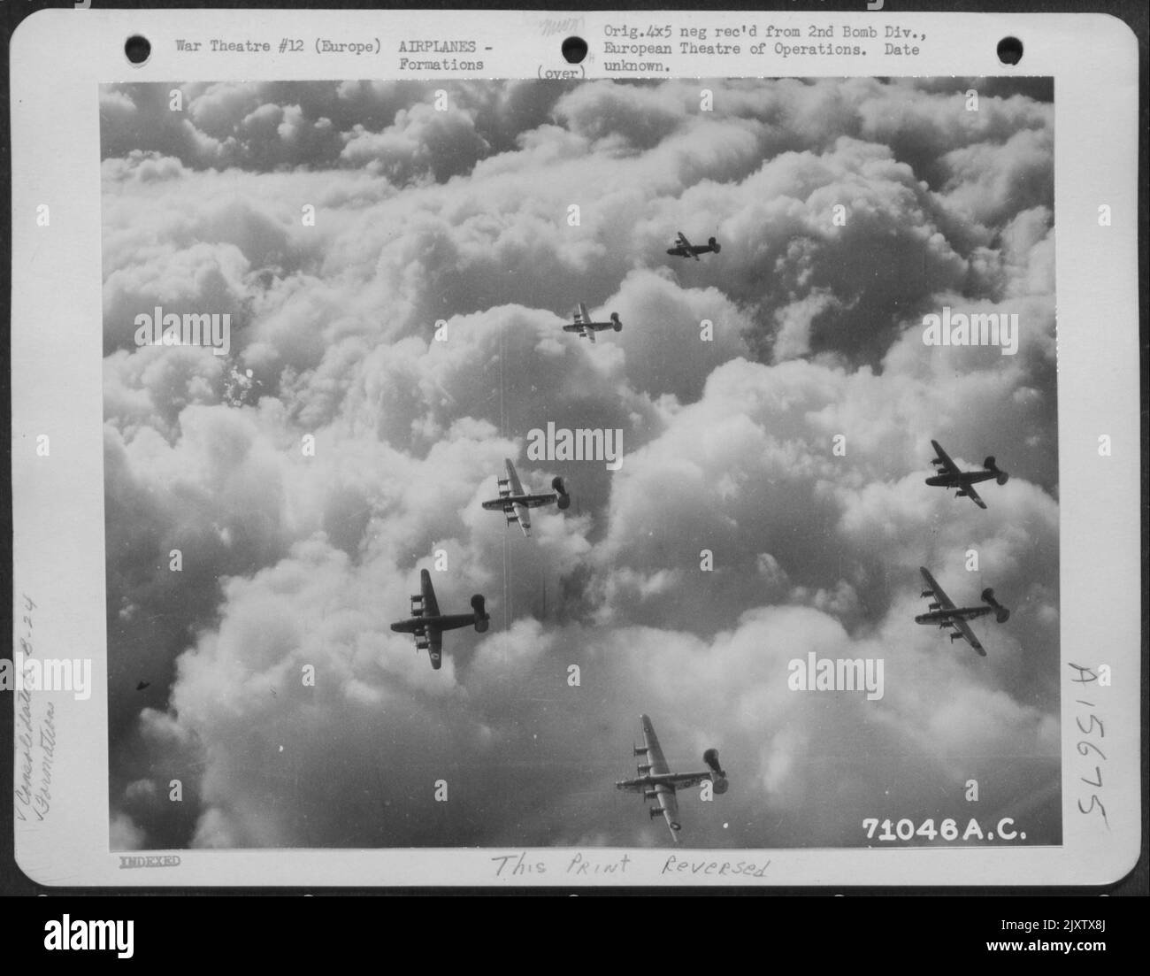 A Formation Of Consolidated B-24 Liberators Roars Over A Blanket Of ...