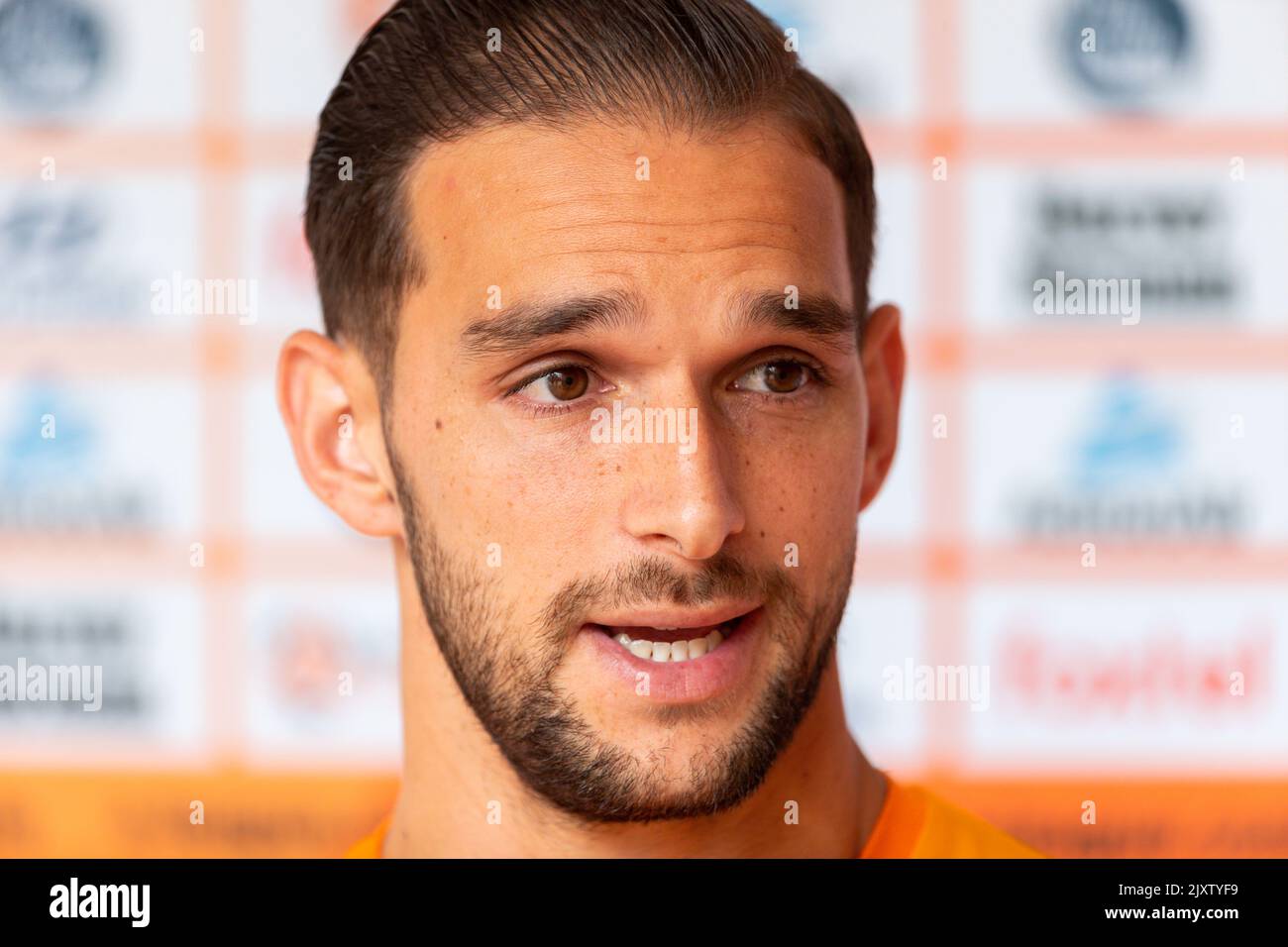 Jack Hingert of the Brisbane Roar is seen speaking to media before a ...