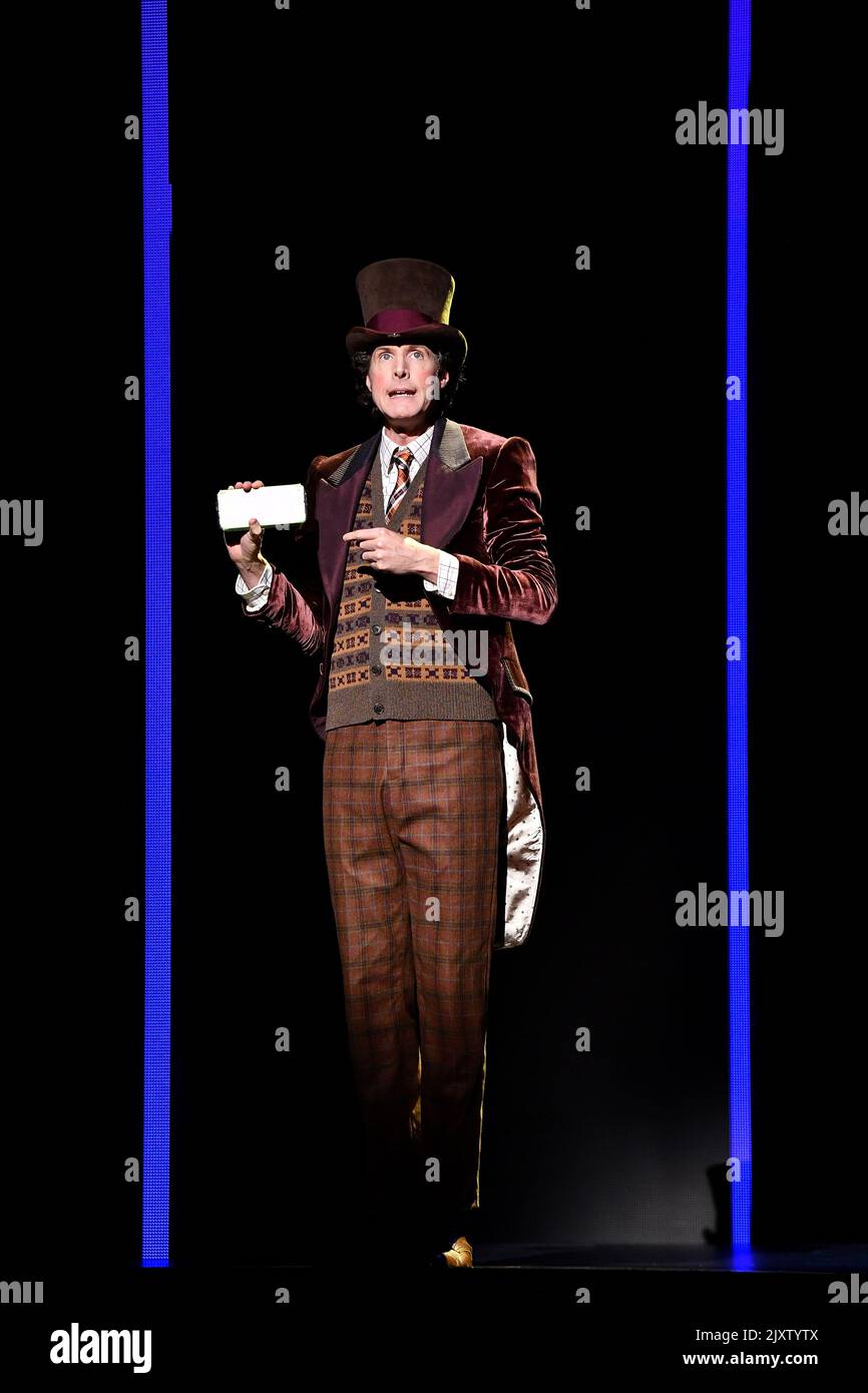 Paul Slade-Smith as Willy Wonka performs a musical scene during a ...