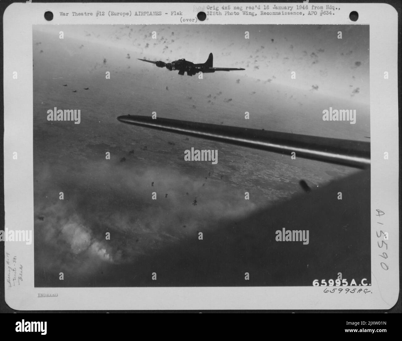 Flak Bursts Perilously Close To Boeing B-17 "Flying Fortress" Of The ...