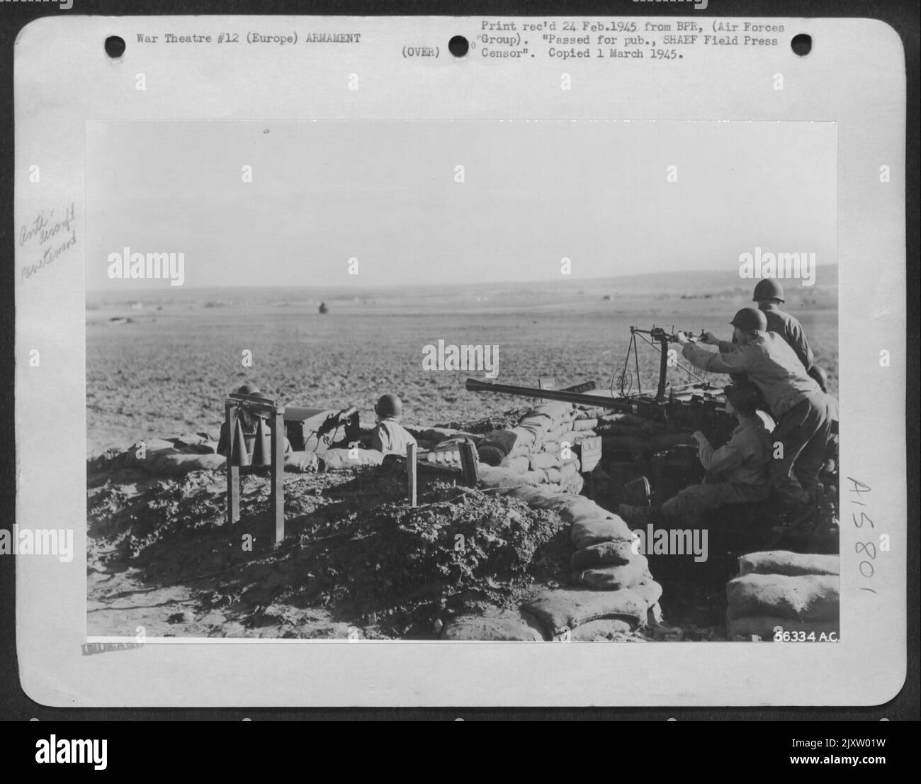 A 9th Air Defense Command gun crew "Zeros" or orients the sights of a ...