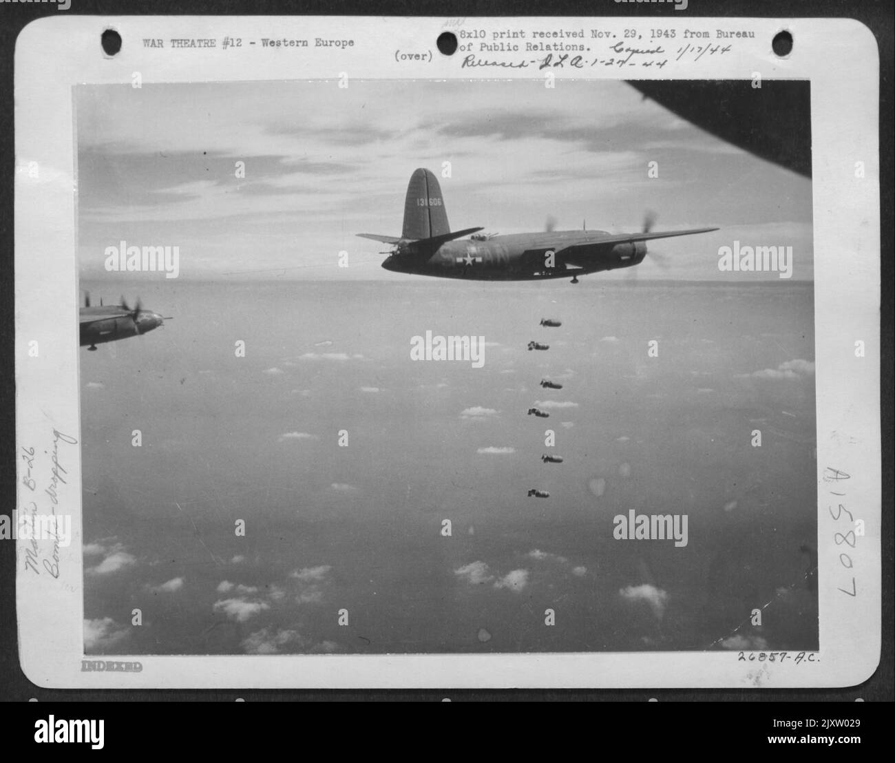 BOMBS AWAY! Six 500-pounders start on their quick trip down to a nazi ...