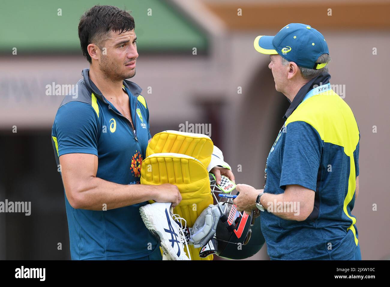 Australian cricketer Marcus Stoinis (left) and Cricket Australia ...