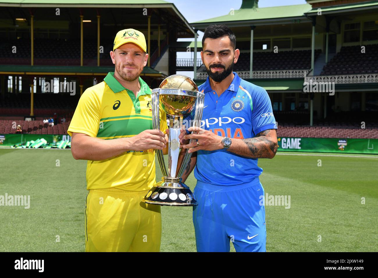 Australian cricket captain Aaron Finch (left) and Indian captain Virat ...