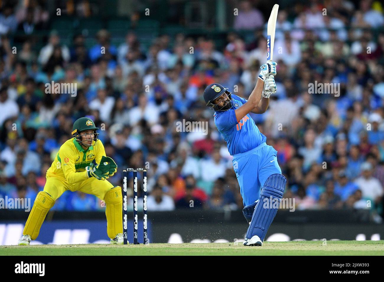 Rohit Sharma of India hits the ball for six during the first One Day ...