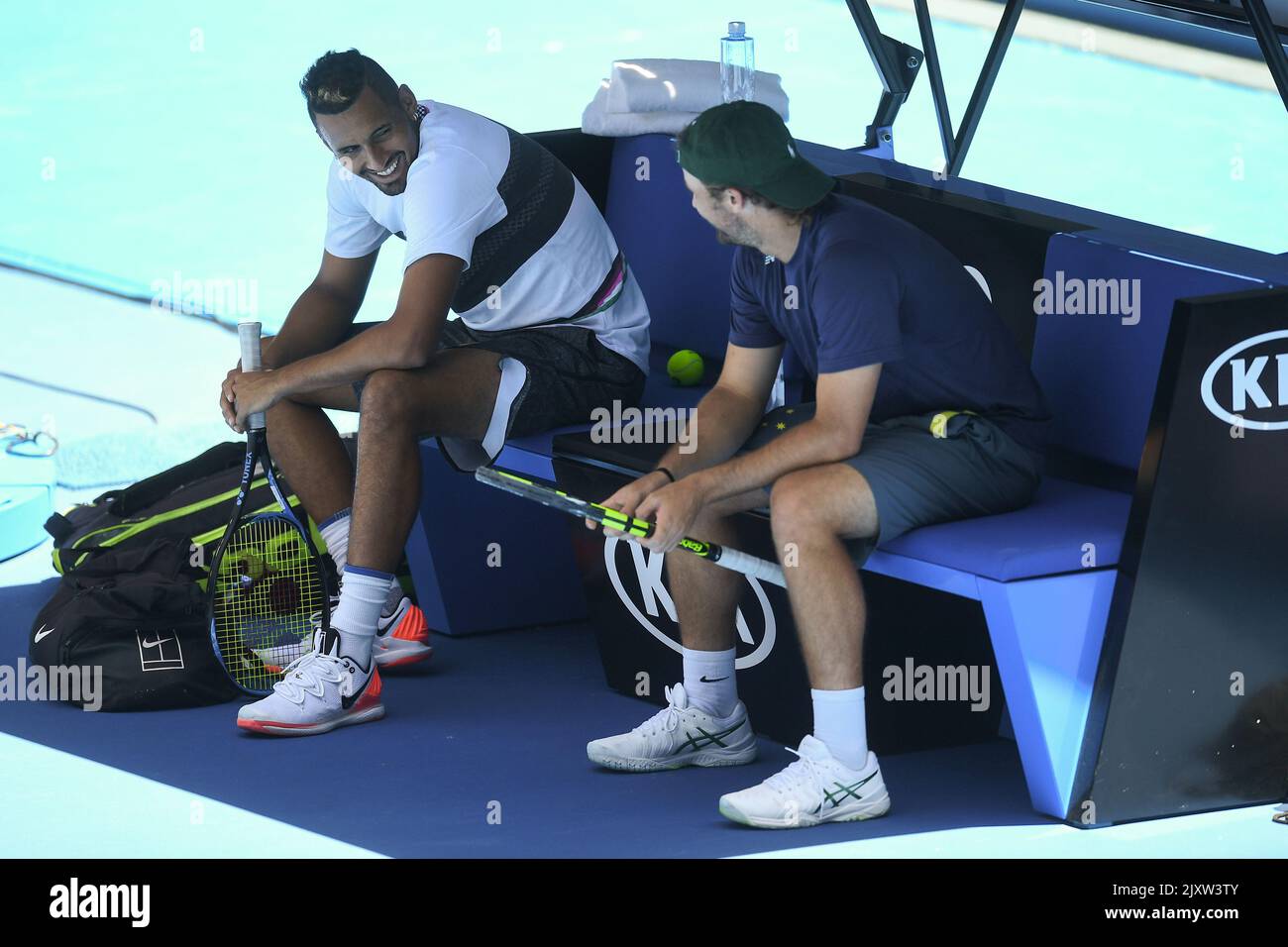 Nick Kyrgios of Australia (left) is seen during a training session ...