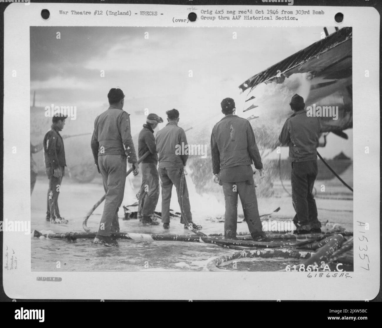 Fire Fighters Use Foamite To Extinguish Flame In The Wing Of A Boeing B ...
