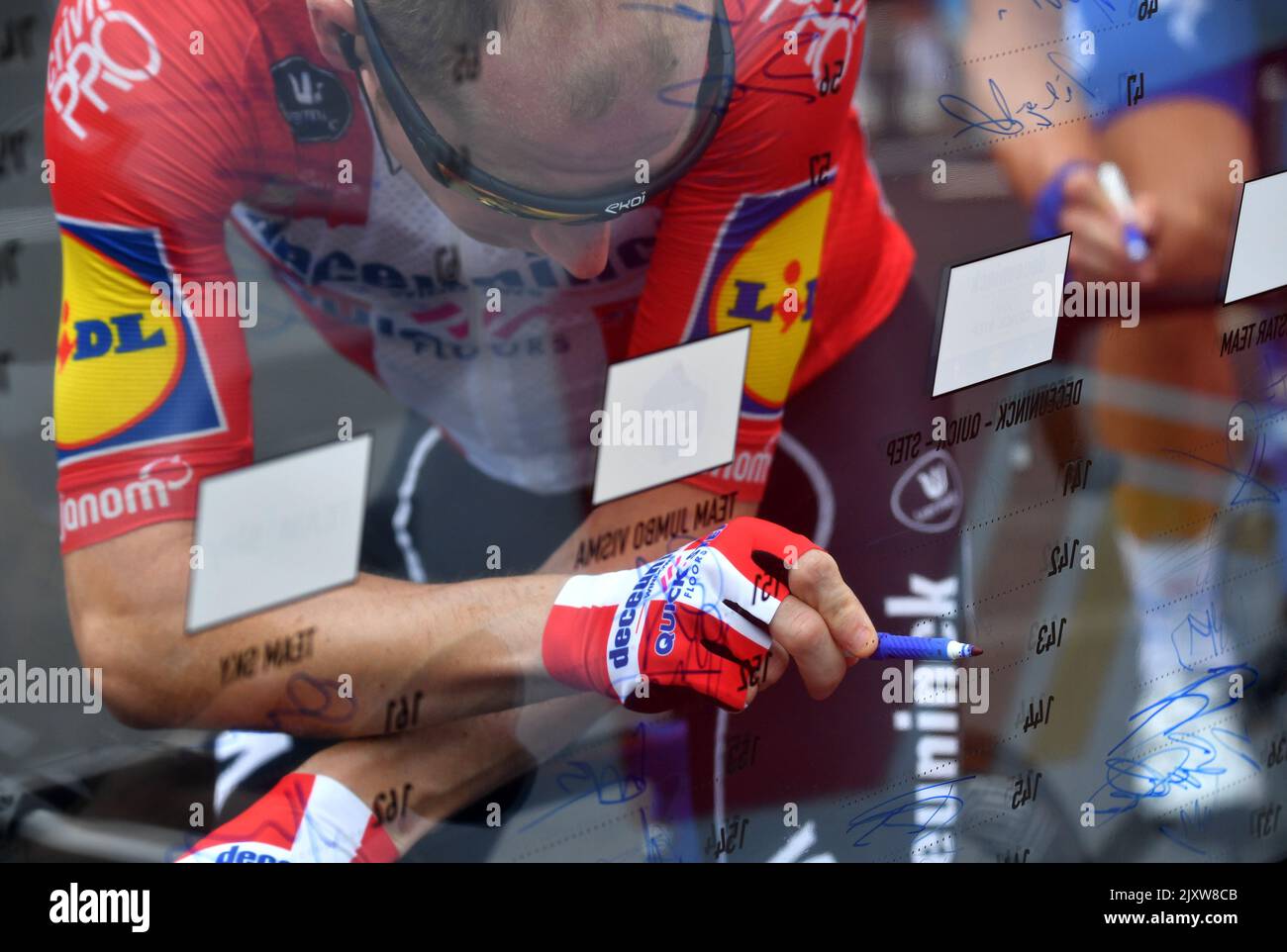 Michael Morkov signs on during stage two of the Tour Down Under from ...