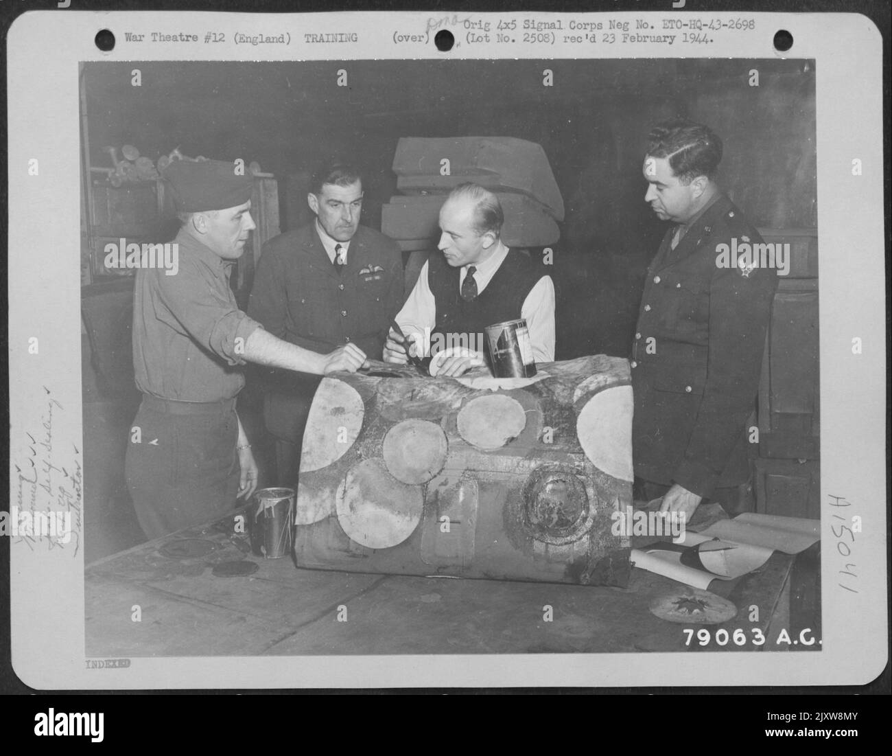 An Instructor Shows Pvt. Henry Andrews Of Cleveland, Ohio How To Paint ...