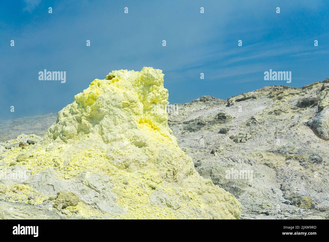 cone of sulfur deposits around a fumarole in a solfataric field against ...