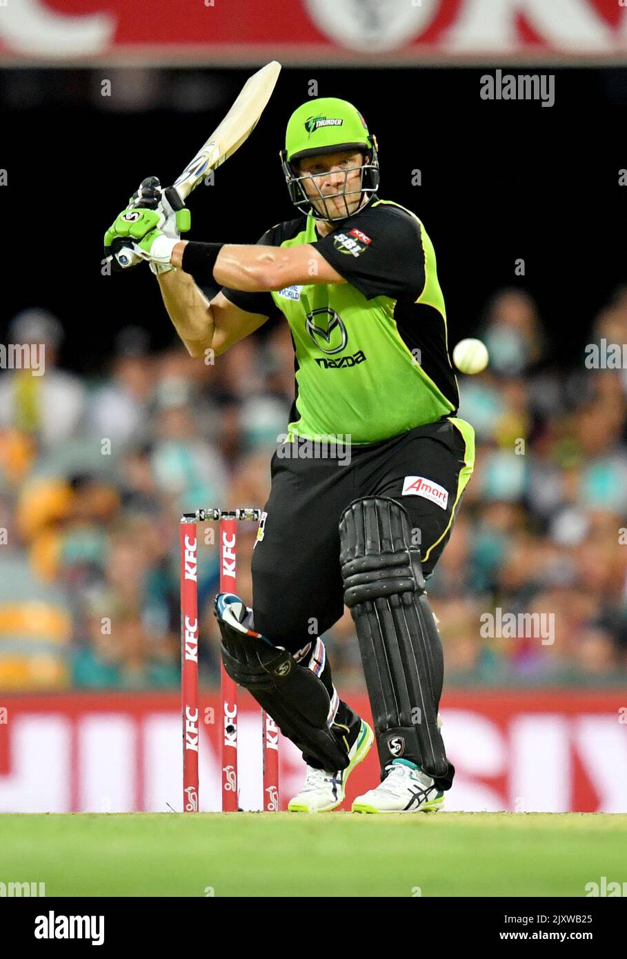 Shane Watson of the Thunder hits four runs during the Big Bash League ...