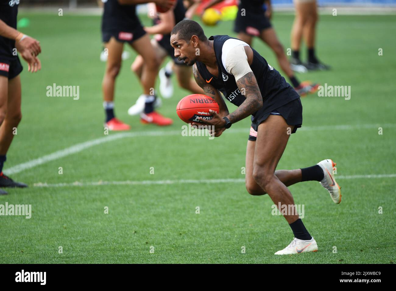 Jarrod Garlett runs with the ball during the Carlton football club's ...
