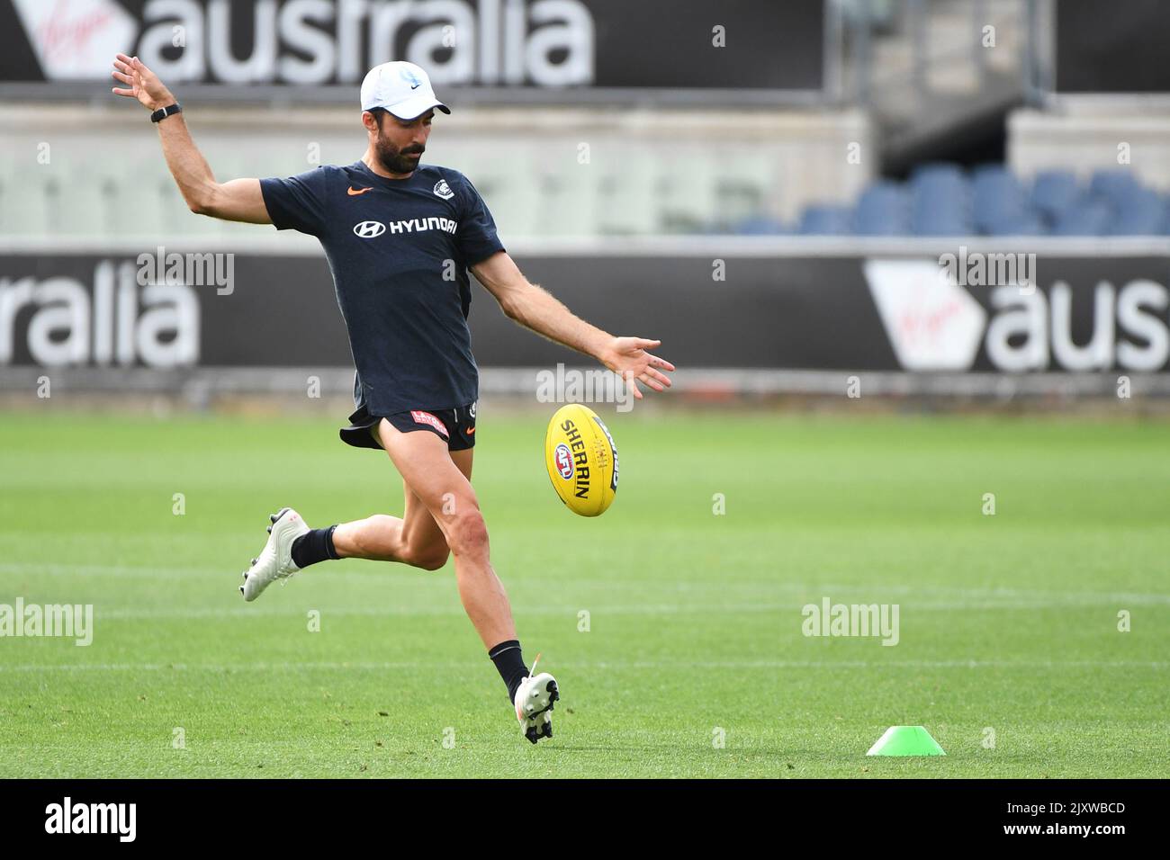 Kade Simpson kicks the ball during the Carlton Football Club's team ...