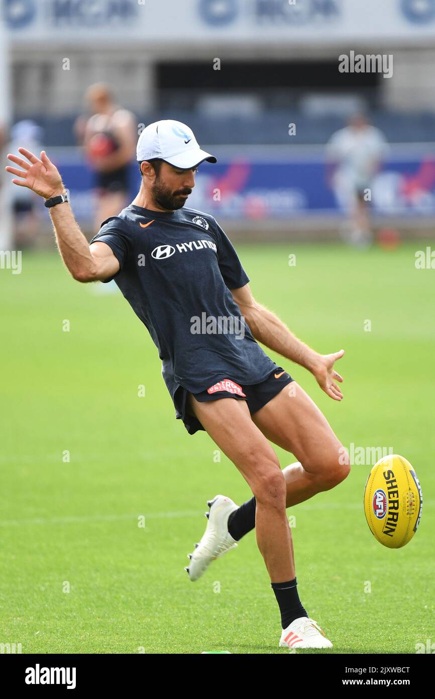 Kade Simpson kicks the ball during the Carlton Football Club's team ...