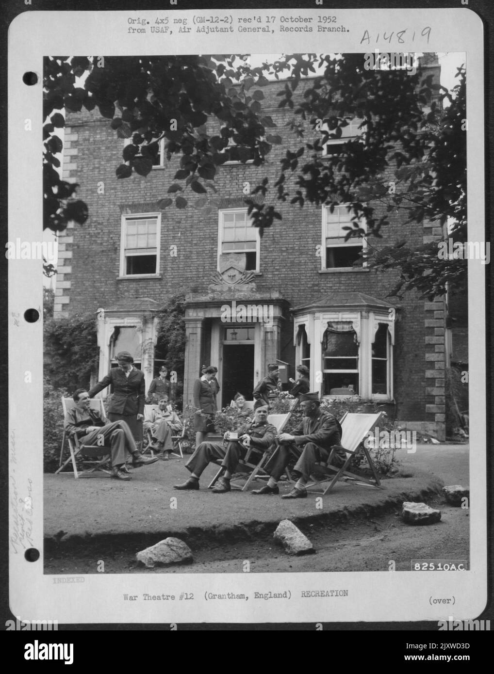 Airmen Of The 9Th Troop Carrier Command Are Seen Relaxing In Front Of A ...