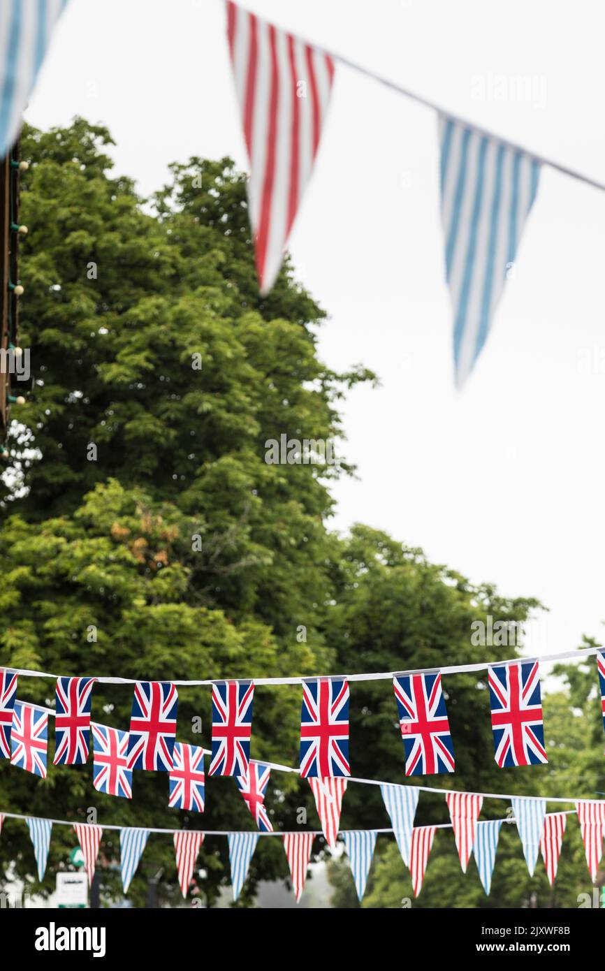 Bunting of Union flags fill a walkway in Haslemere to celebrate the ...