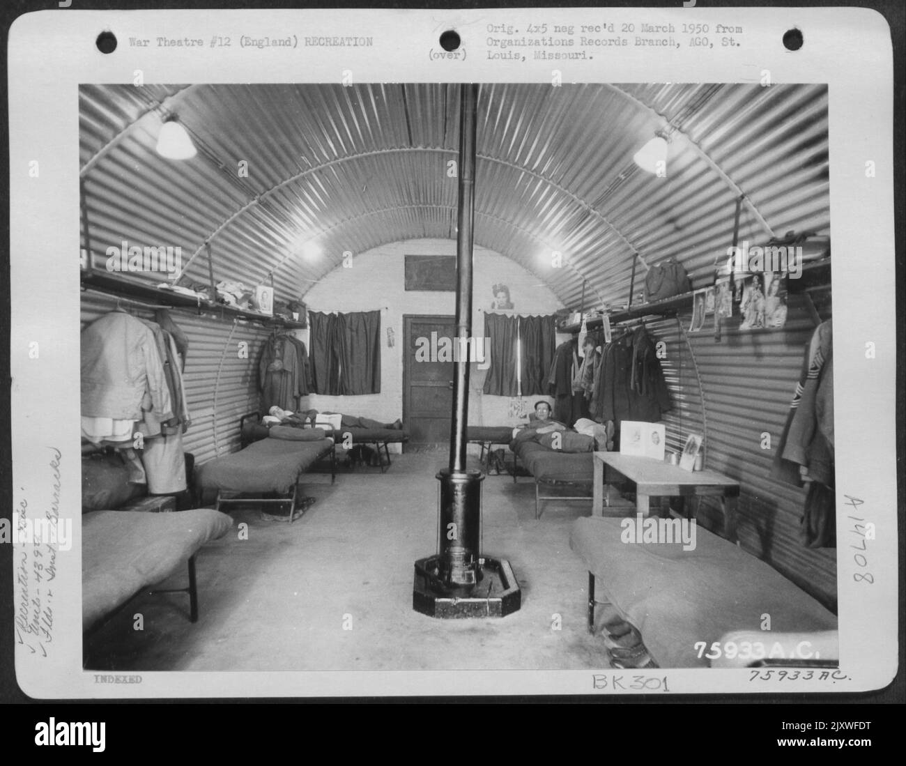 Two Members Of The 439Th Troop Carrier Group Relax In Their Barracks ...