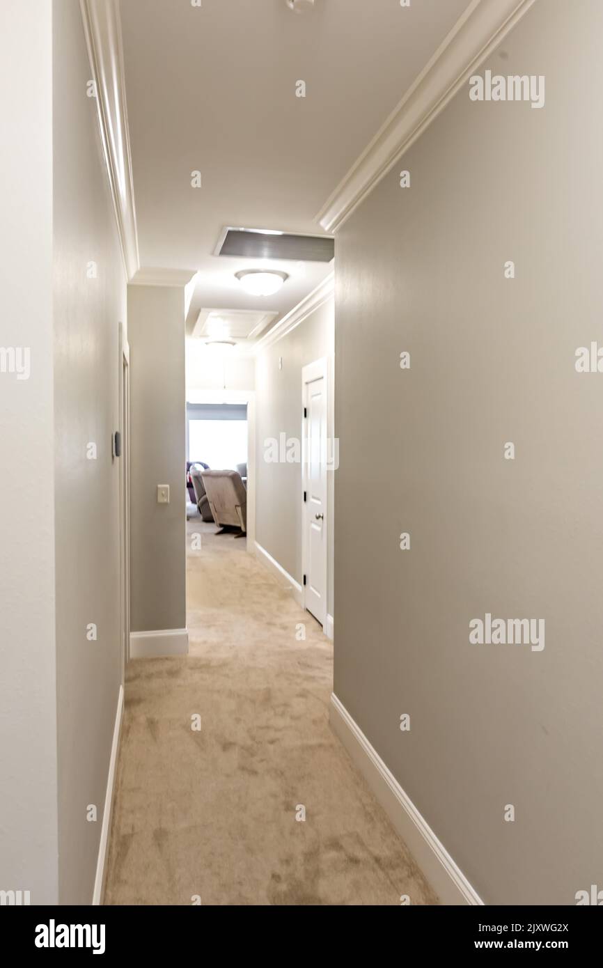 A gray beige greige hallway in a new construction house Stock Photo - Alamy