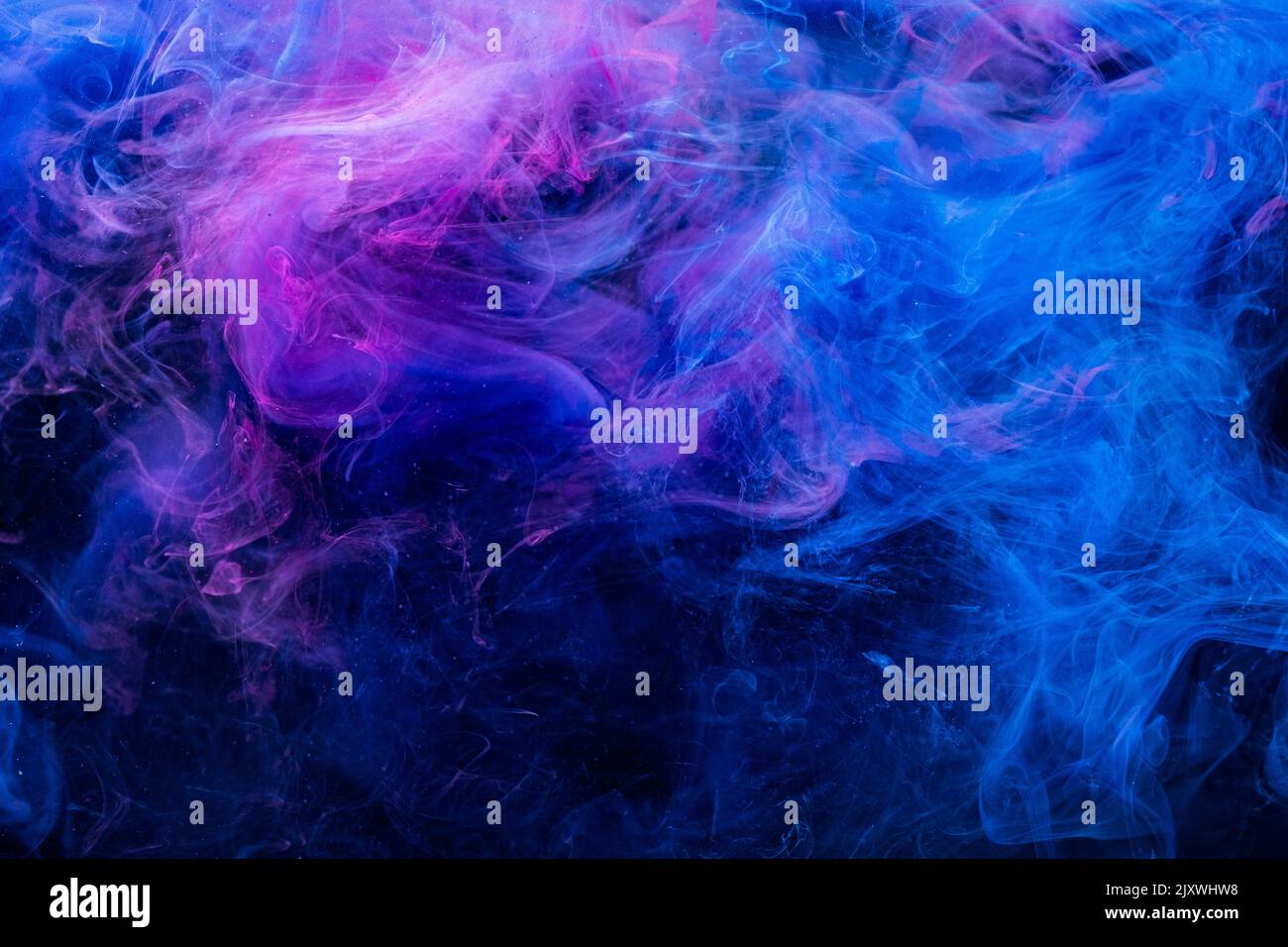 neon smoke colorful background paint blue pink Stock Photo - Alamy
