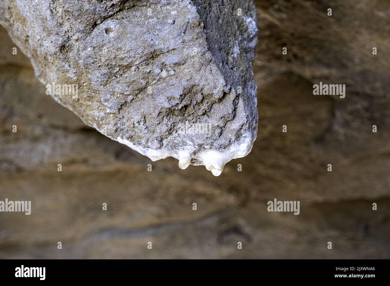 Detail of water falling on an ancient rock formation Stock Photo - Alamy