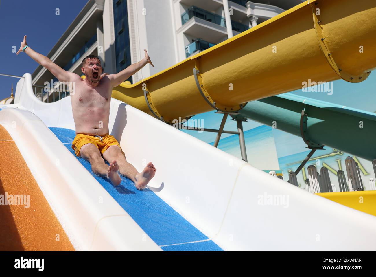 Going down the slide hi-res stock photography and images - Alamy