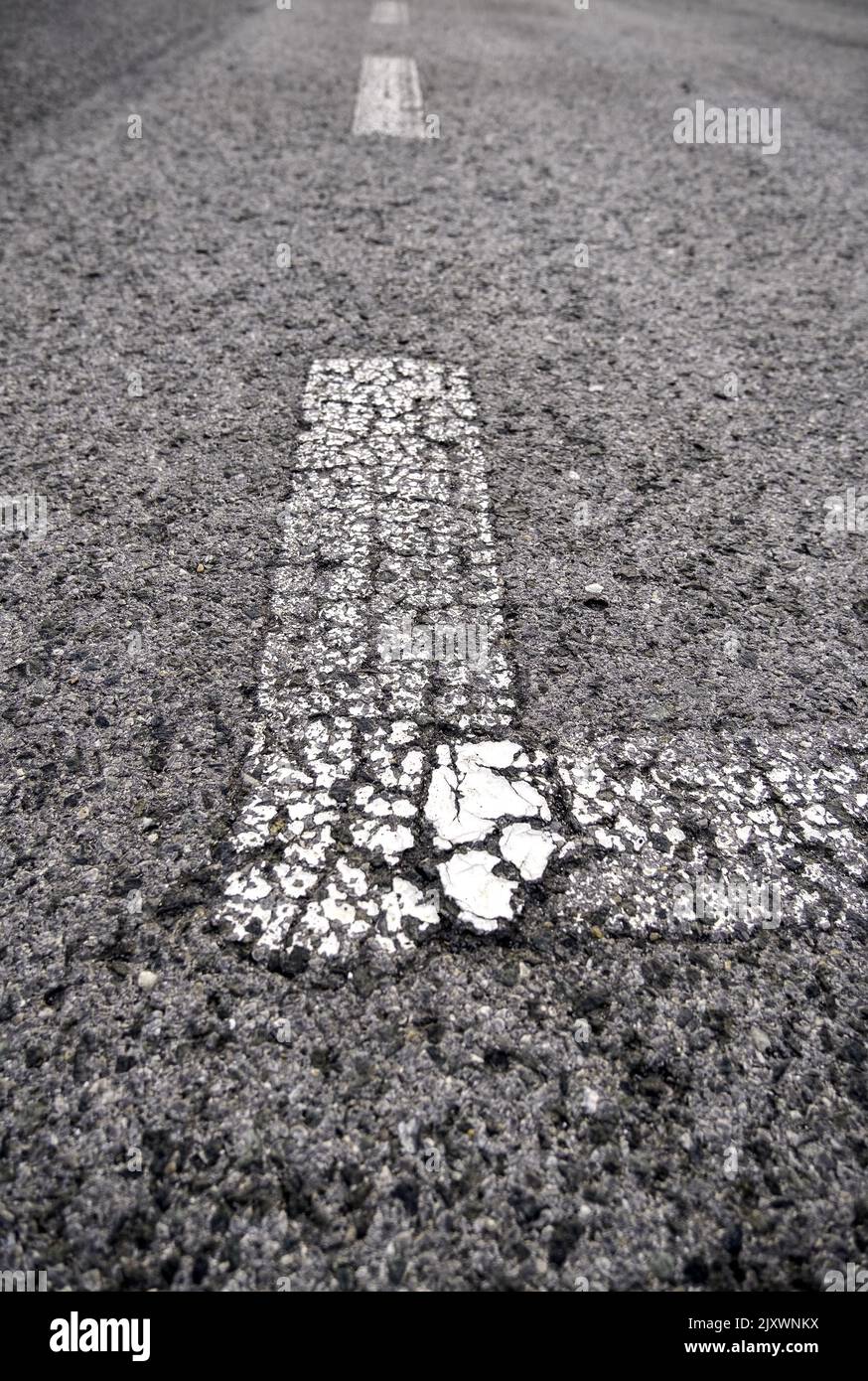 Marking lines on the asphalt, information sign Stock Photo - Alamy