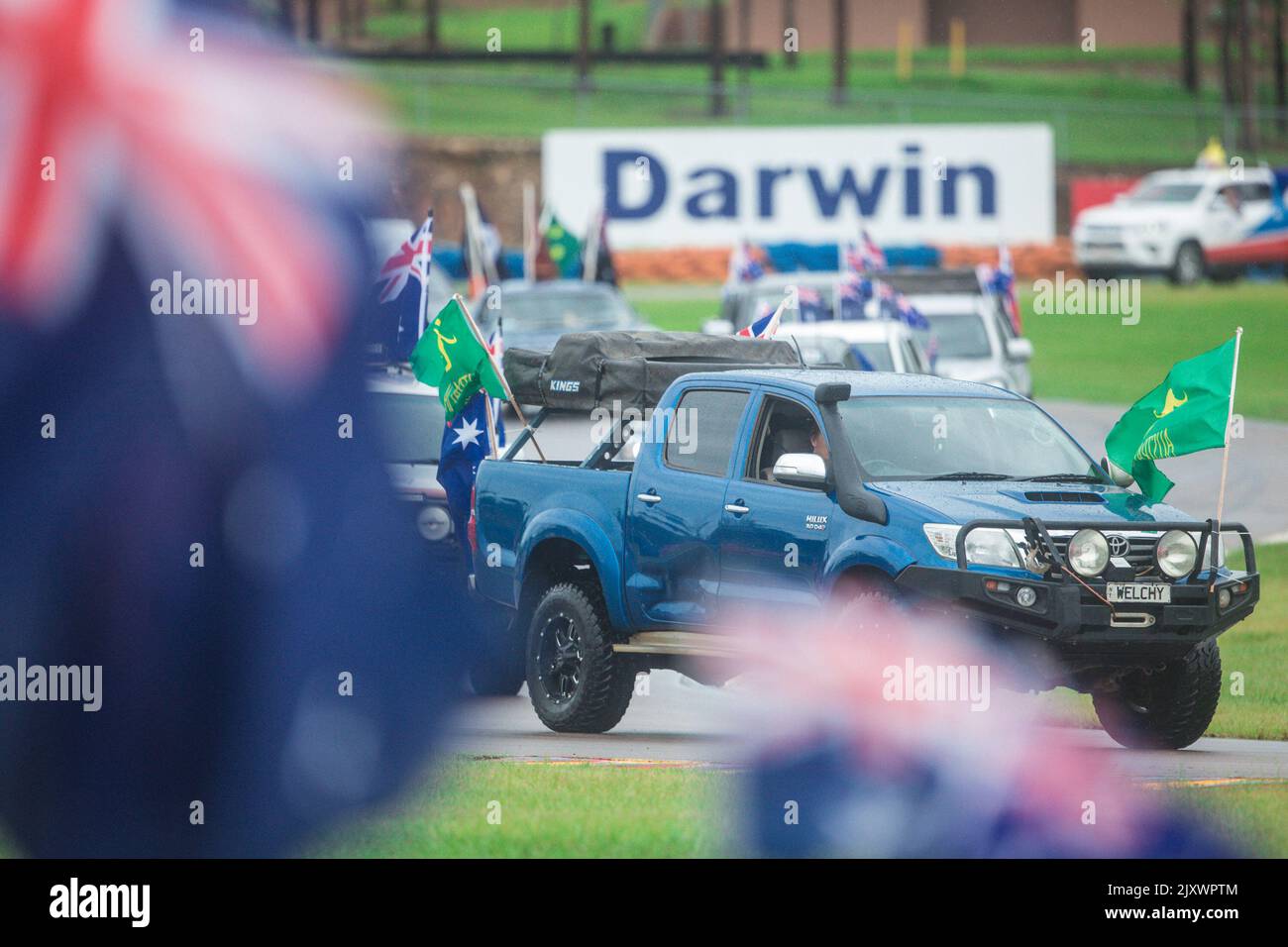 The convoy leaves Darwin Hidden Valley Raceway during Australia Day Ute ...