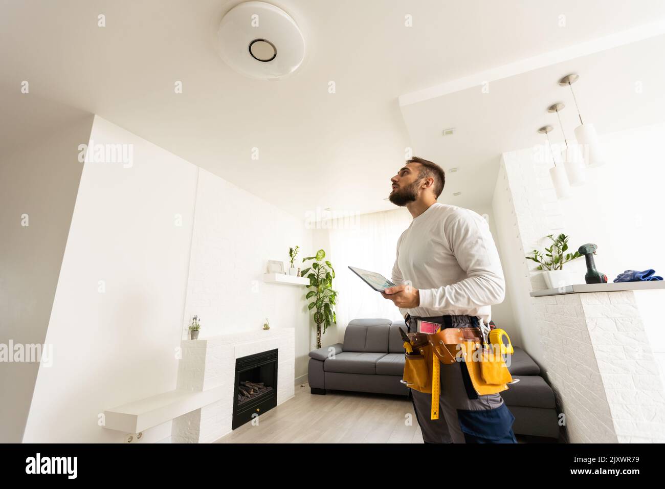 repair, construction and building concept - happy smiling worker or ...