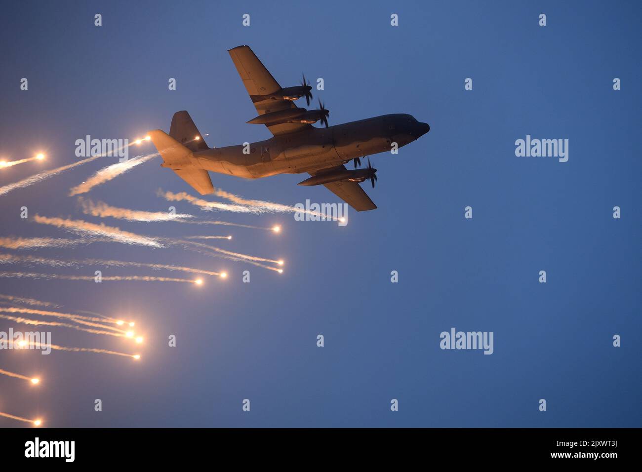 A Royal Australian Air Force C-130J Hercules aircraft deploys flares as ...