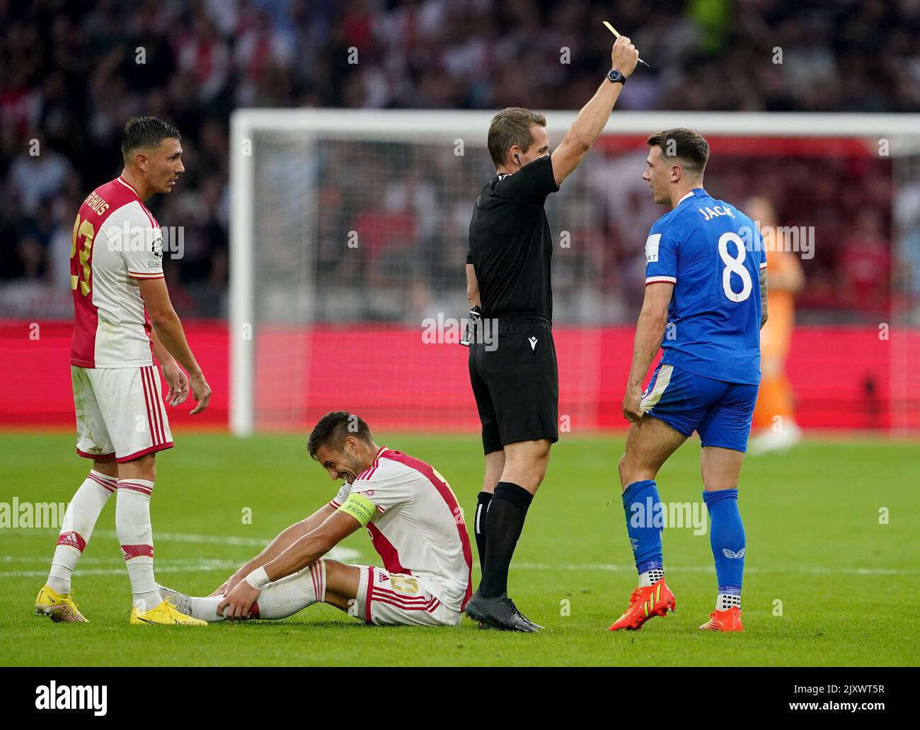 Rangers' Ryan Jack is shown a yellow card for a foul during the UEFA ...