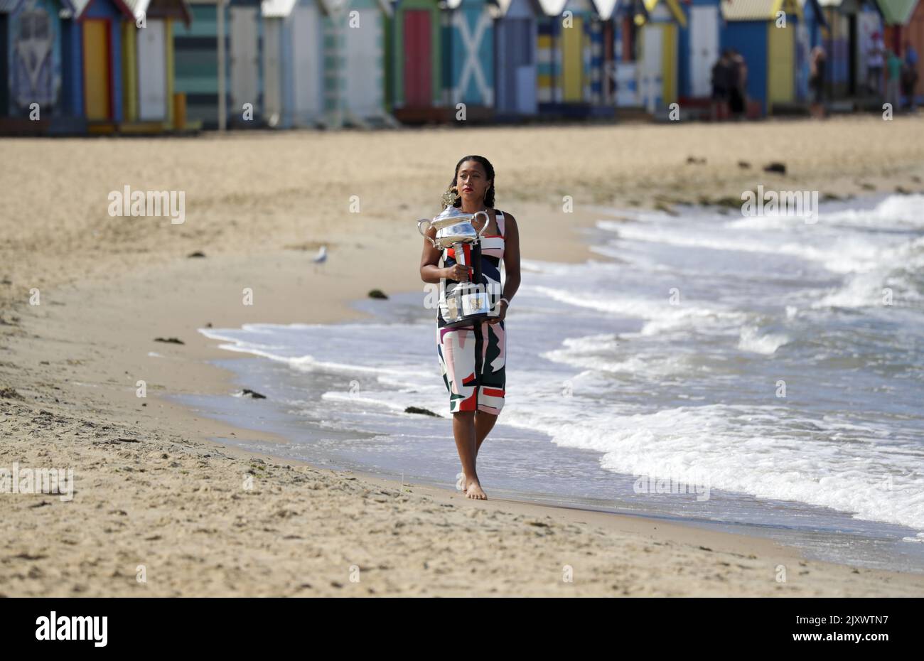 Naomi Osaka of Japan poses for photographs with the Daphne Akhurst Memorial Cup at Brighton ...