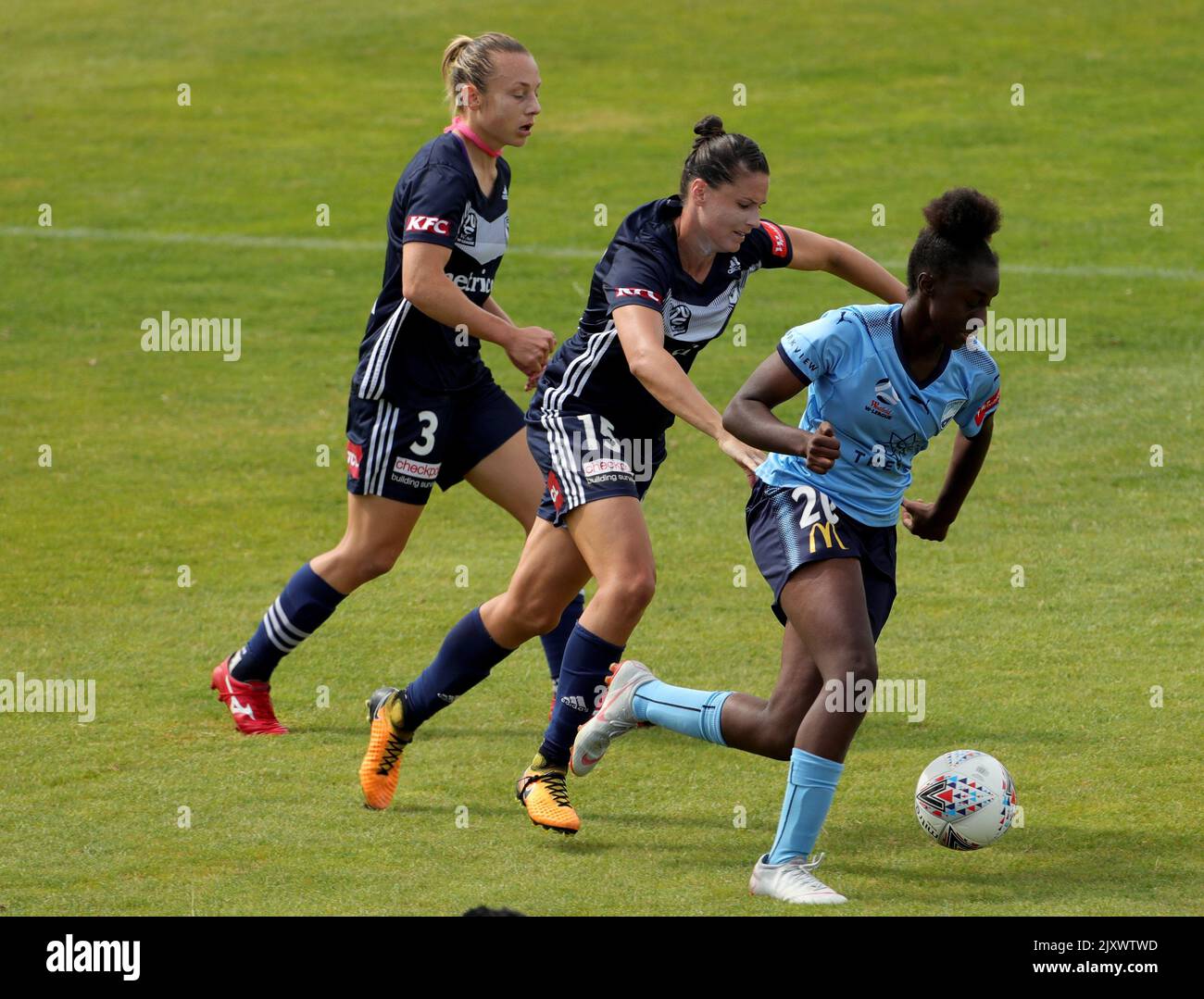 Princess Ibini-Isei of Sydney leads the Victory defenders during the ...