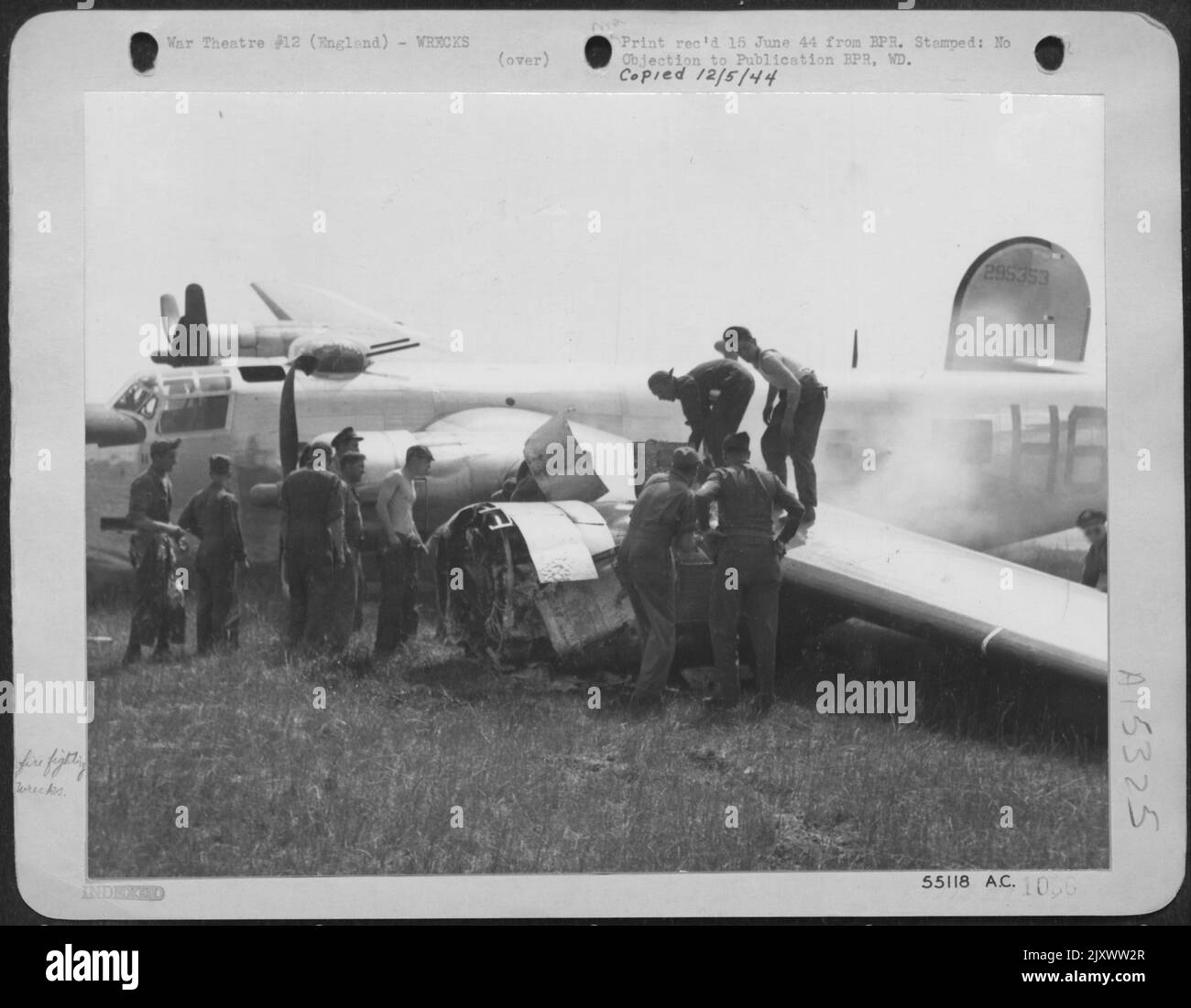 FLAK DAMAGED CONSOLIDATED B-24 LIBERATOR CRASH LANDS---Fire fighting ...