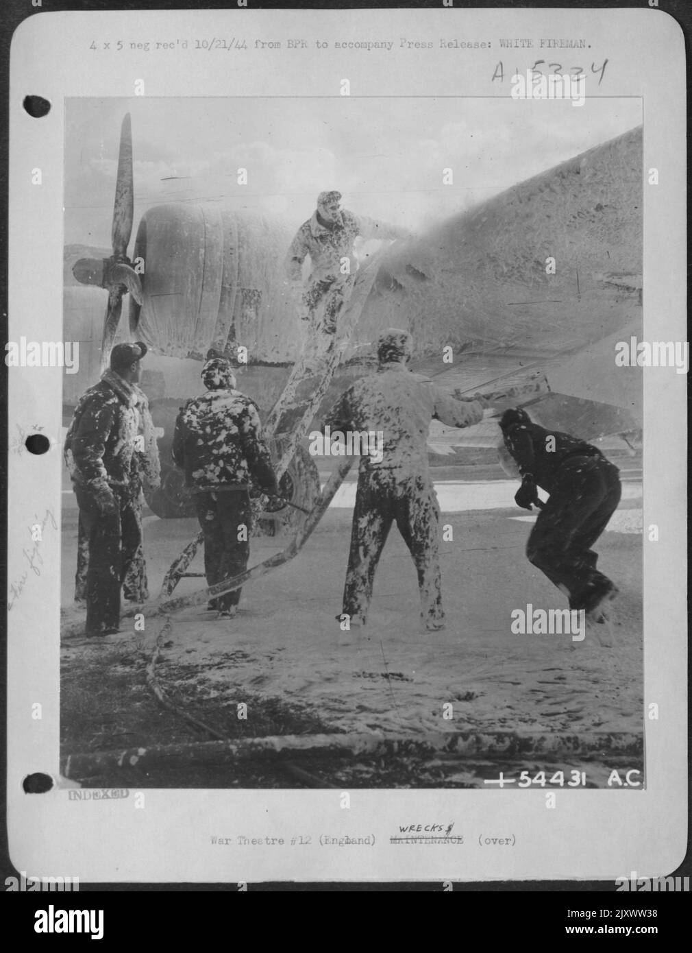 WHITE FIREMAN-Almost completely covered by the fire-smothering ofam ...